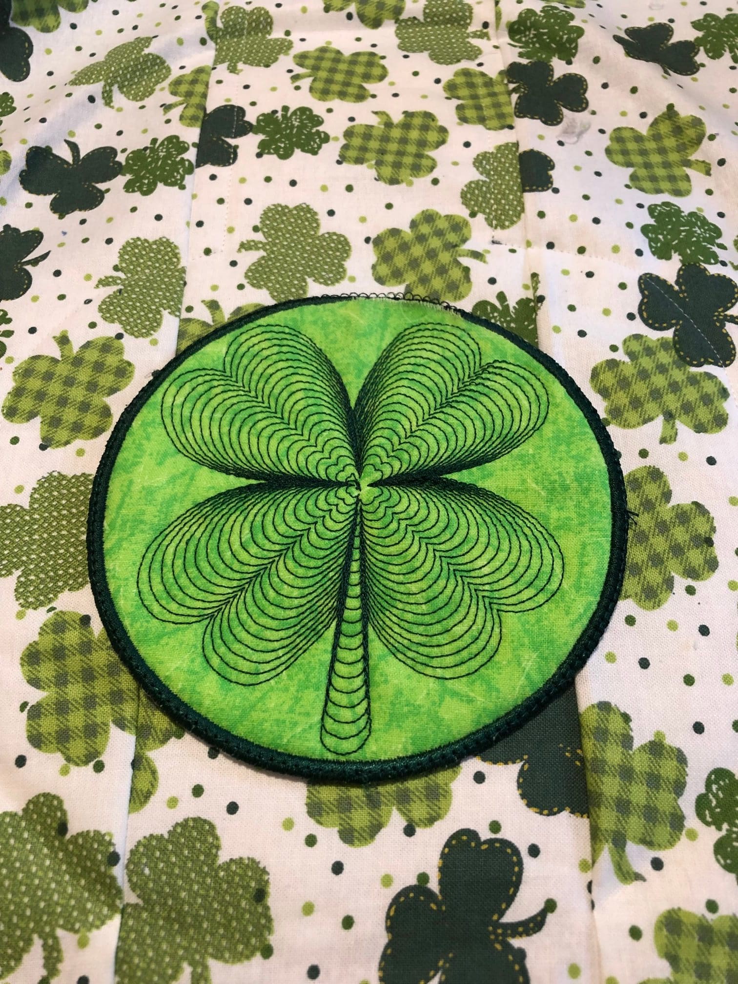Lucky Clover embroidered mug rug